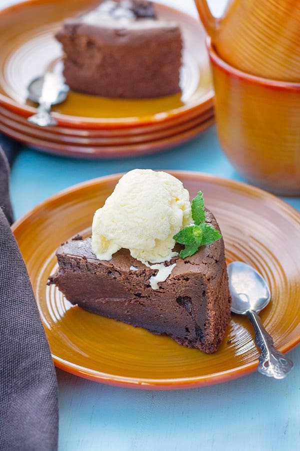 Chocolate Fondant Cake Served with Vanilla Ice-cream Stock Photo ...