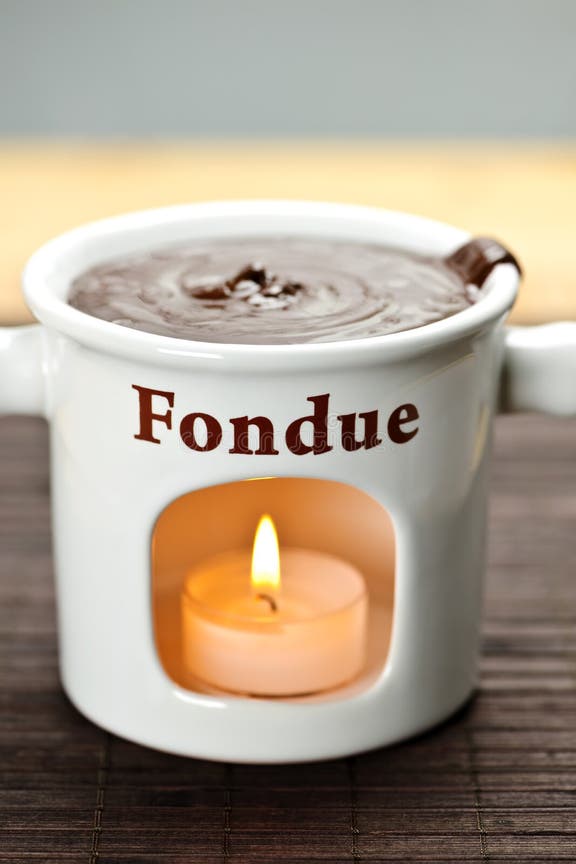 Chocolate fondue pot stock image. Image of fondue, ceramic - 12665857