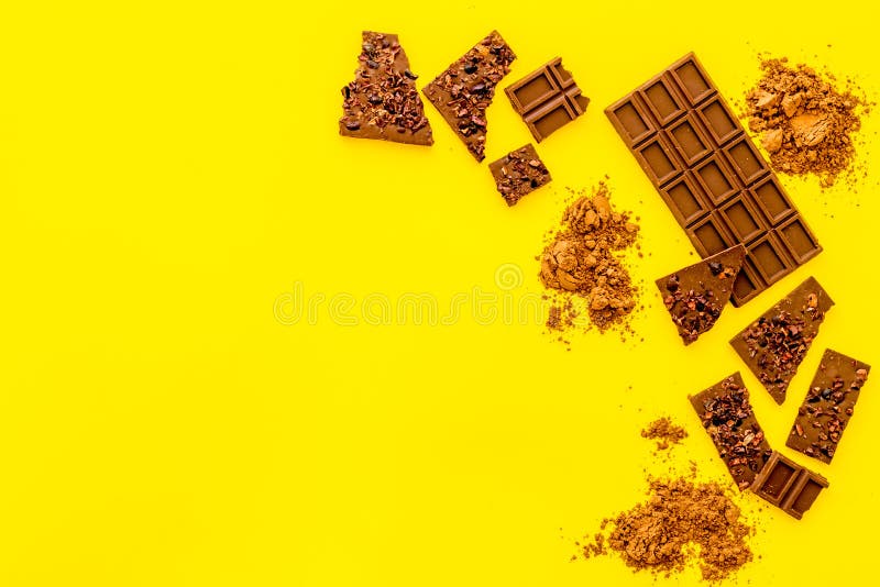 Chocolate Frame. Broken Bars and Cocoa Powder on Yellow Background ...