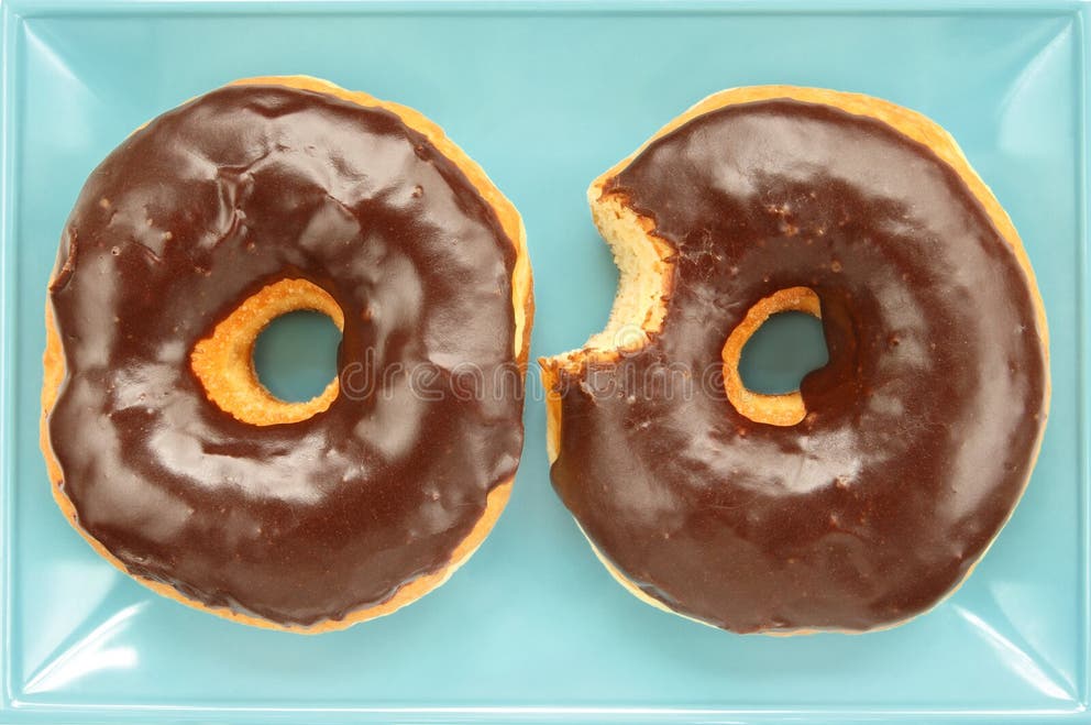 Chocolate Frosted Raised Donuts Stock Image - Image of decadent, junk ...