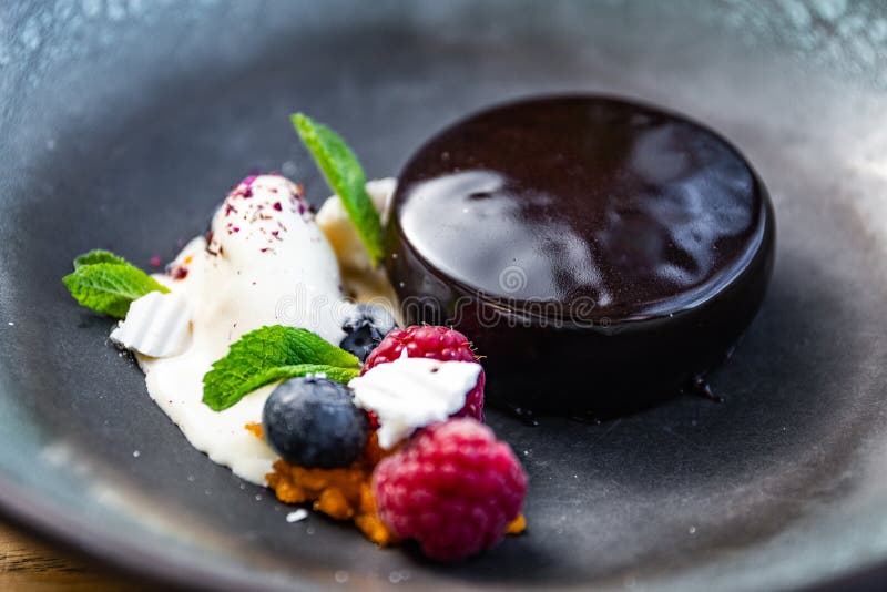 Chocolate Fudge Mousse Cake with Ice Cream,berries Stock Image - Image ...