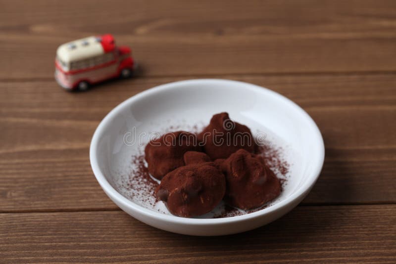 Chocolate Ganache Crunch on Wooden Table Stock Image - Image of cacao ...
