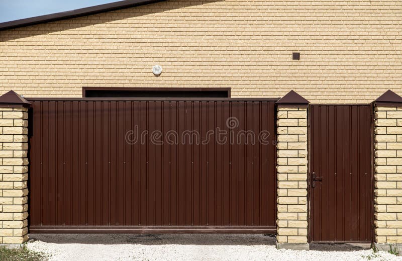 Chocolate Gate in a Brick House Stock Photo - Image of automatic ...