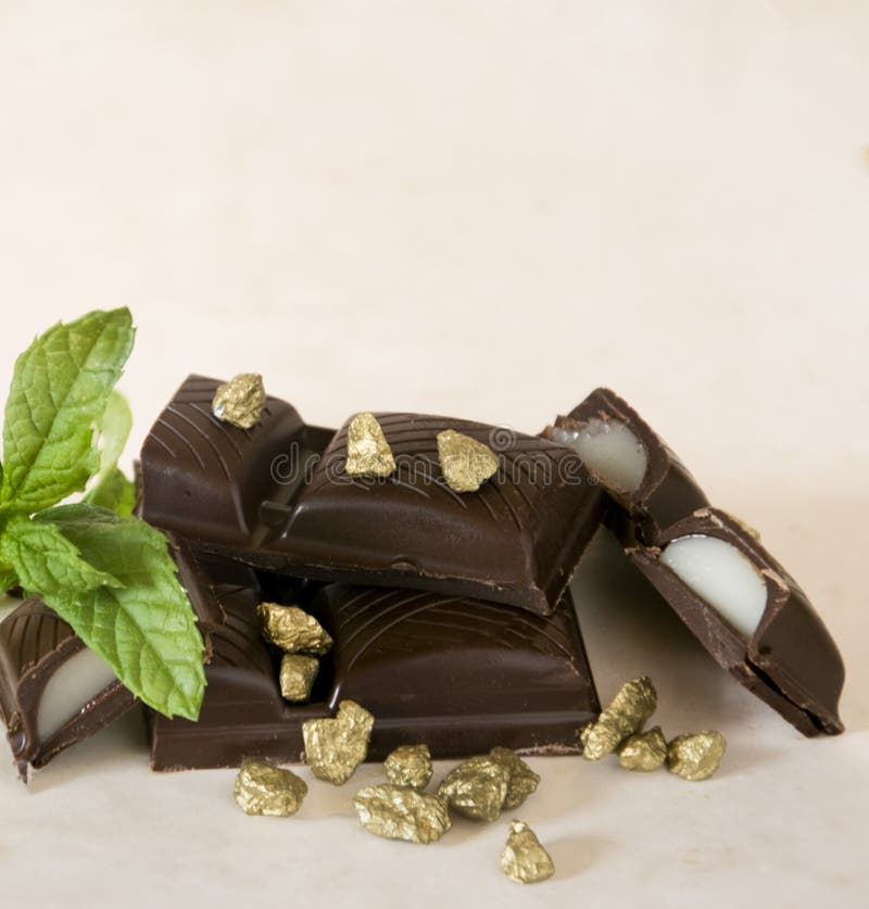 Chocolate with gold. stock photo. Image of addictive - 120422854