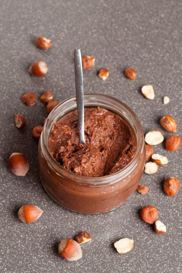 Chocolate Paste Spread with Hazelnuts and Bread for Breakfast Stock ...