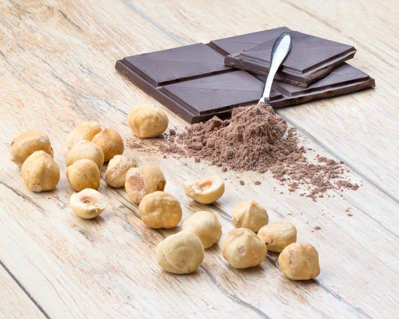 Chocolate and Hazelnuts stock photo. Image of chocolate - 50628368