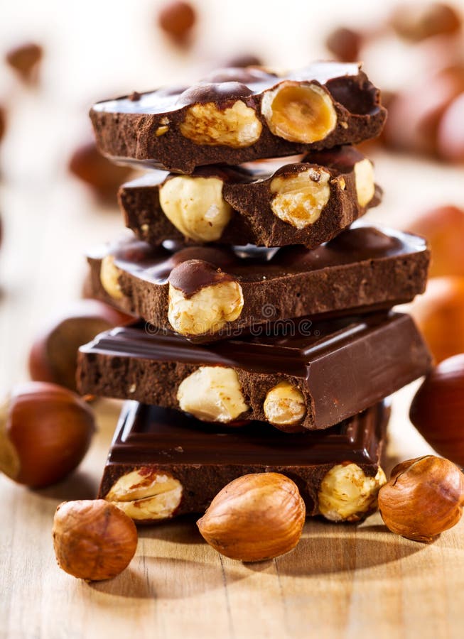 Chocolate with hazelnuts stock image. Image of heap, nutrition - 34915087