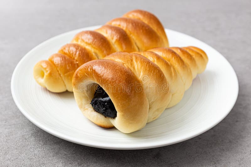 Chocolate Horn Bread in the Shape of a Cone Filled with Chocolate Stock ...