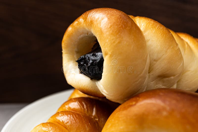 Chocolate Horn Bread in the Shape of a Cone Filled with Chocolate Stock ...