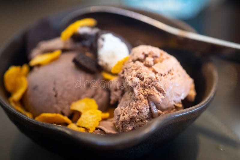 Chocolate Ice Cream Ball Topping with Corn Flake and Chocolate Biscuits ...