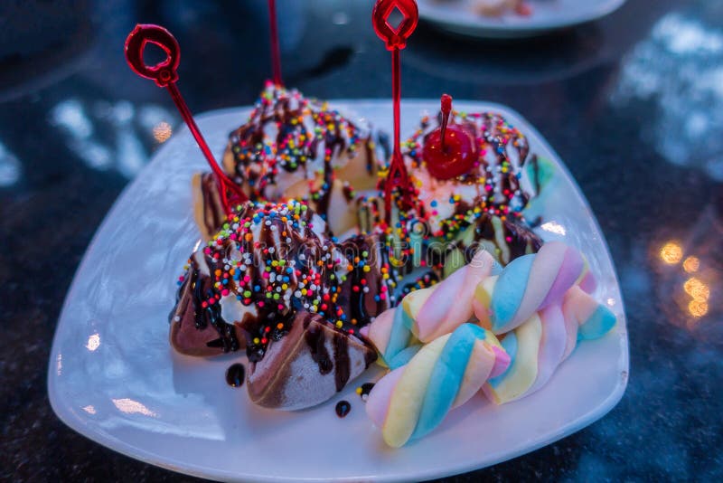 Chocolate Ice Cream on a Black Stone Table. Stock Photo - Image of ...
