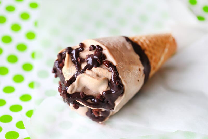 Chocolate Ice Cream in a Chocolate Cone Stock Image - Image of drops ...