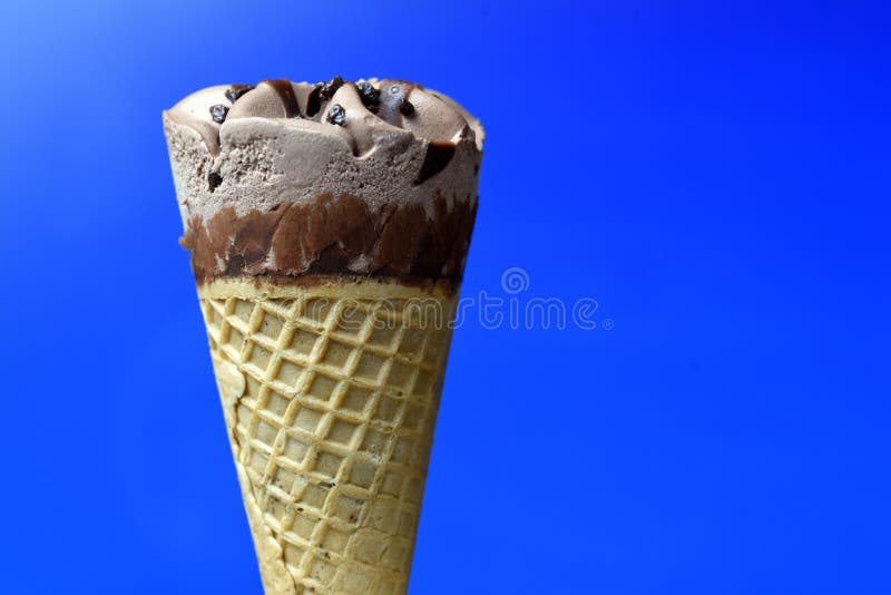 Chocolate Ice Cream Cone on Blue Background Stock Image - Image of ...