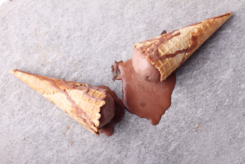 Chocolate Ice Cream Cones Dropped on Ground Stock Photo - Image of food ...