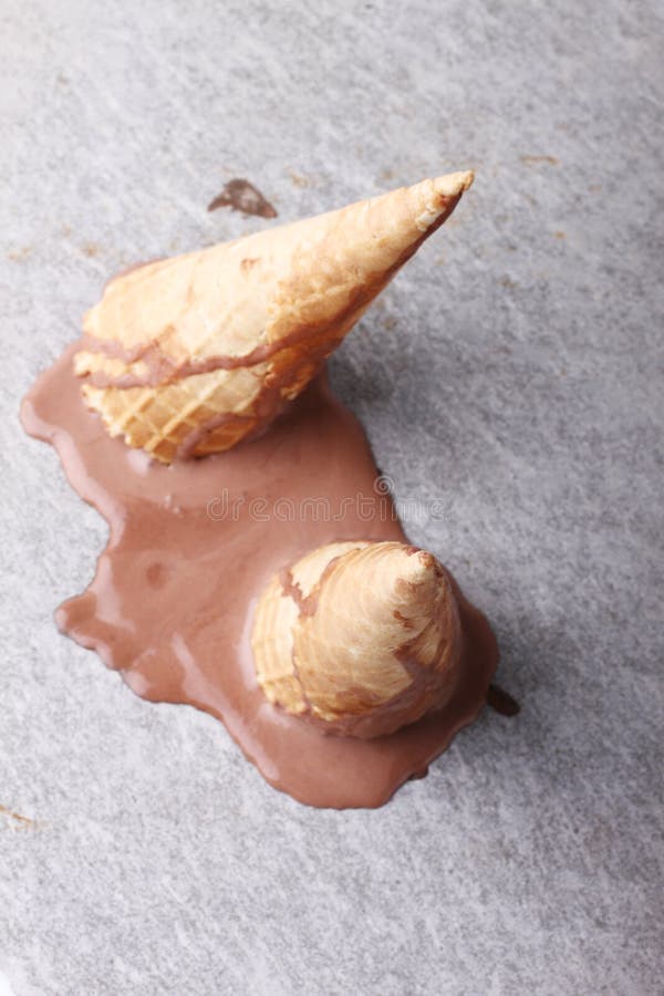 Chocolate Ice Cream Cones Dropped Melt on Ground Stock Image - Image of ...