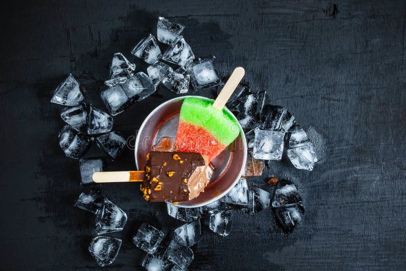 Chocolate Ice Cream Sticks in a Bowl on the Table. Stock Image - Image ...