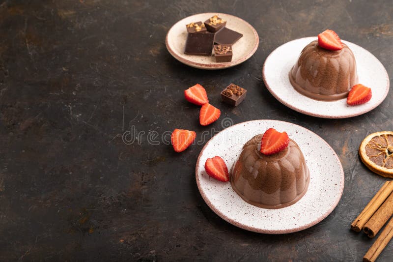 Chocolate Jelly with Strawberry on Black Concrete, Side View, Copy ...