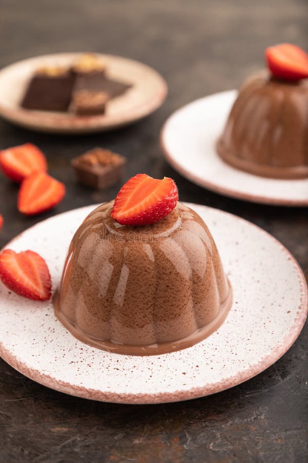 Chocolate Jelly with Strawberry on Black Concrete, Side View, Selective ...