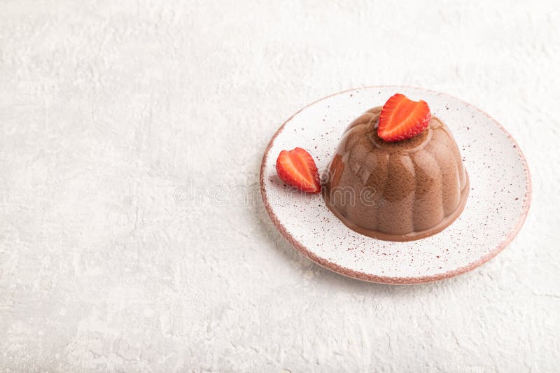 Chocolate Jelly with Strawberry on Gray Concrete, Side View, Copy Space ...