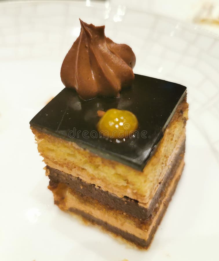 Chocolate Layer Cake Plating at White Plate Stock Photo - Image of ...