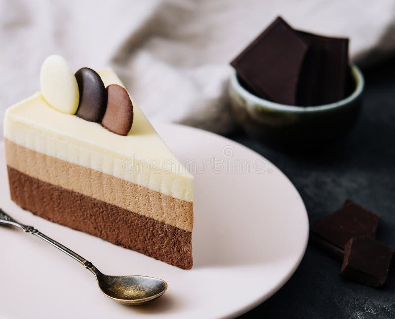 Chocolate Layered Mousse Cake on Plate Stock Image - Image of pastry ...