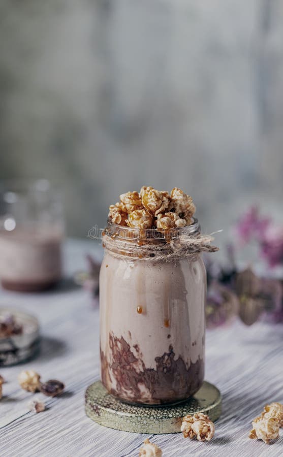 Chocolate Milkshake with Caramel Popcorn. Selective Focus Stock Photo ...