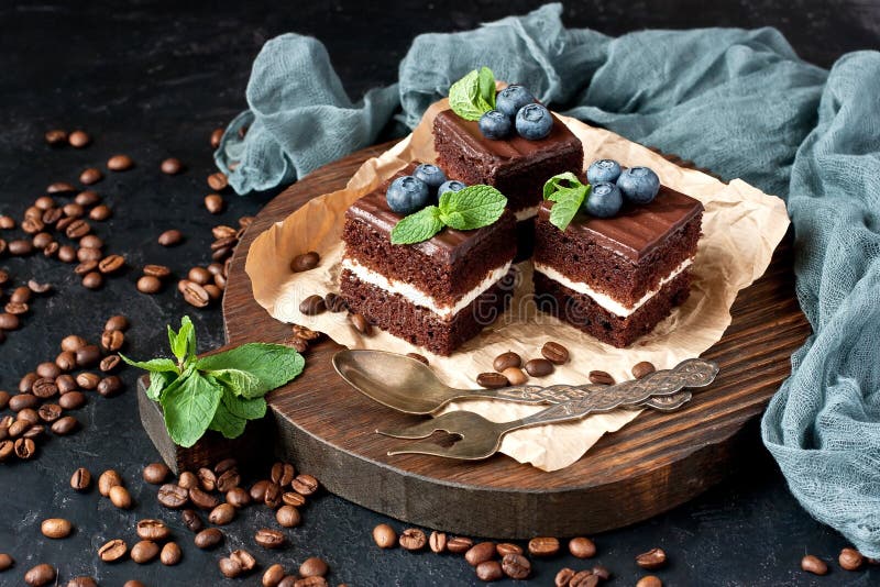 Chocolate Mini Cakes with Berries Stock Photo - Image of craft, leaves ...