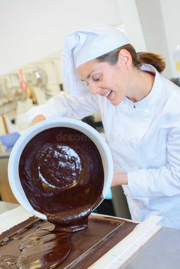 Chocolate Moulding and Baker Stock Image - Image of pour, sweet: 119525963
