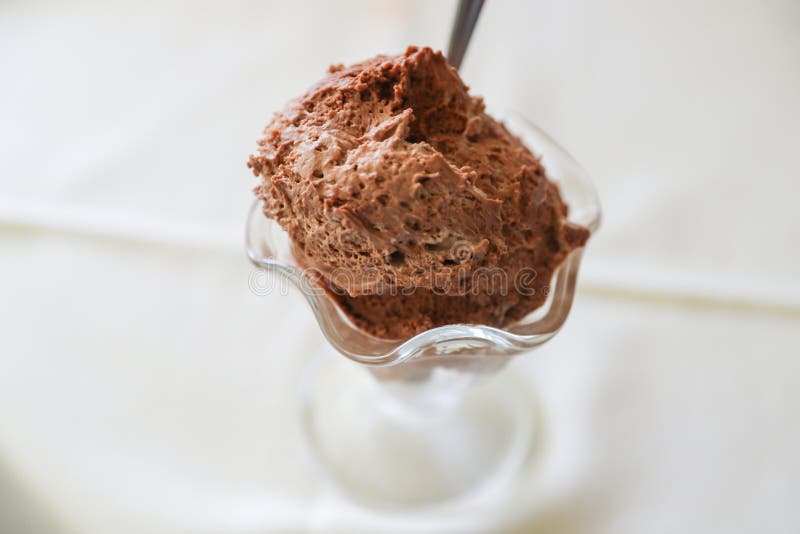 Chocolate Mousse with a Spoon in Portion Glasses on White Table Stock ...