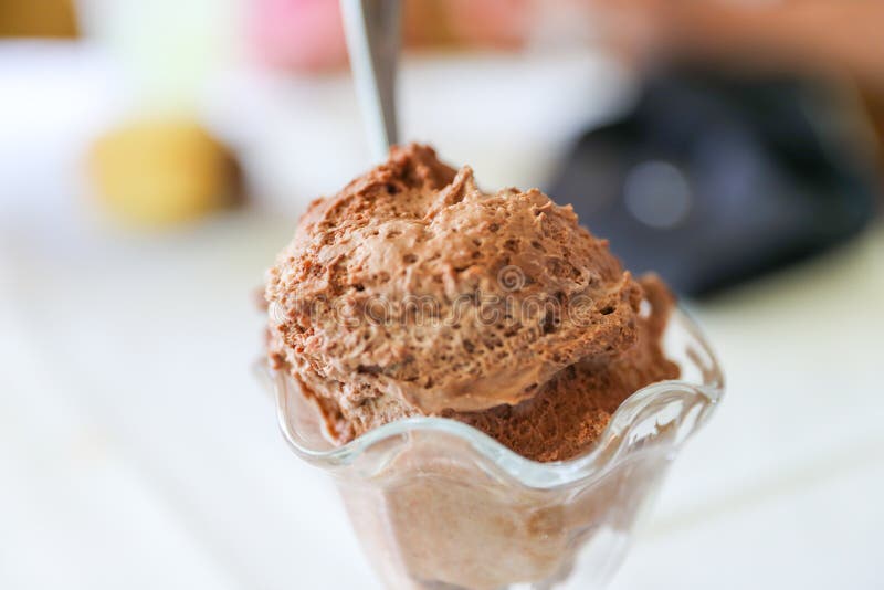 Chocolate Mousse with a Spoon in Portion Glasses on White Table Stock ...