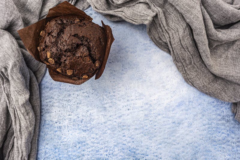 Chocolate Muffin on a Blue-gray Surface, Top View with Place for ...