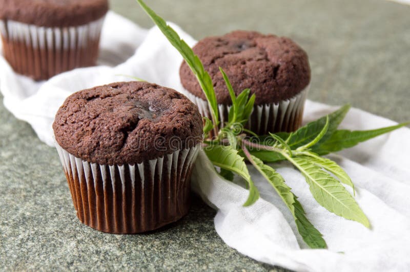 Chocolate Muffins with Marijuana Leaves Stock Photo - Image of ...