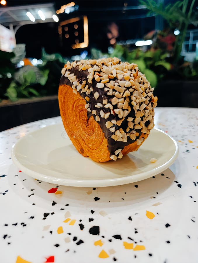 Chocolate and Nut Covered Croissant Roll Pastry Stock Image - Image of ...