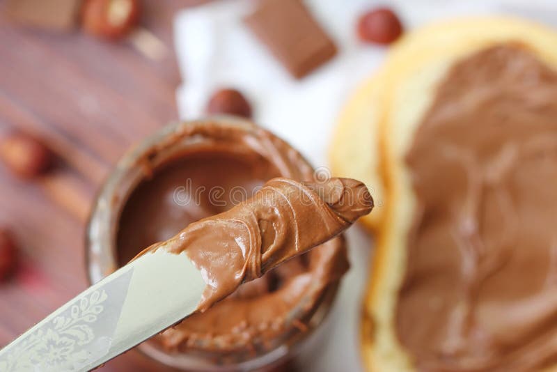 Chocolate Nut Paste with Bread Stock Photo - Image of nougat, cream ...