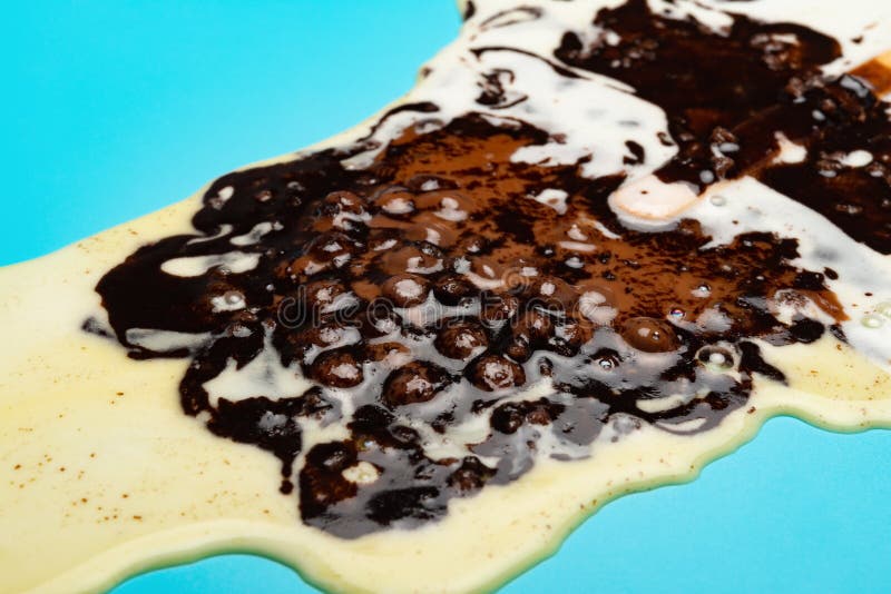 Chocolate Outer Popsicle with Beans Melted Complete on Blue Stock Image ...