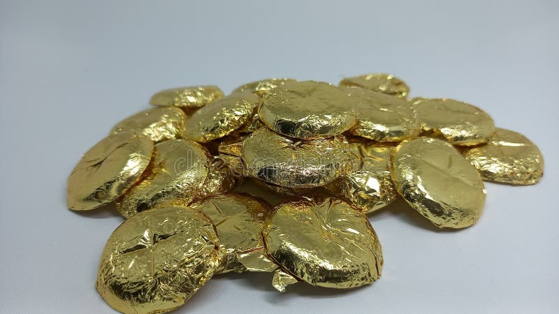 Chocolate Packed in Gold Aluminum Foil Stock Image - Image of bead ...