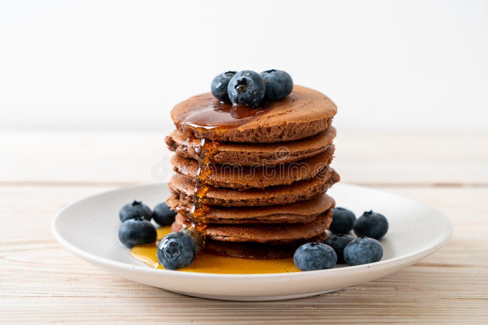 Chocolate Pancake Stack with Blueberry and Honey Stock Image - Image of ...
