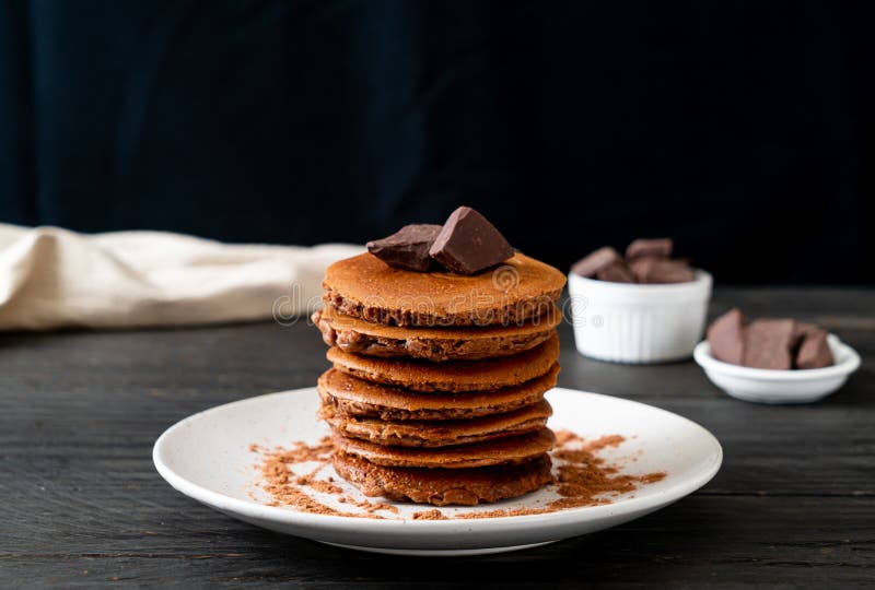Chocolate Pancake Stack on Plate Stock Image - Image of pancake, brown ...