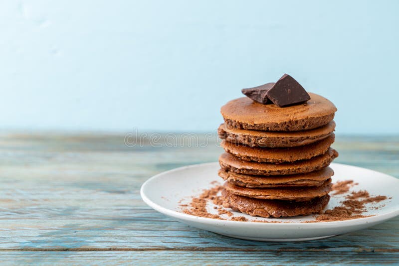 Chocolate Pancake Stack on Plate Stock Image - Image of golden ...