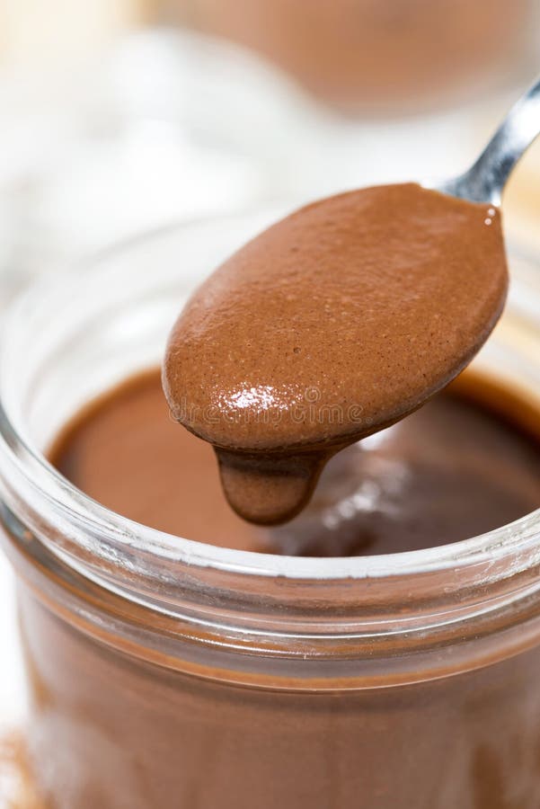 Chocolate Paste in a Glass Jar, Closeup Stock Image - Image of ...