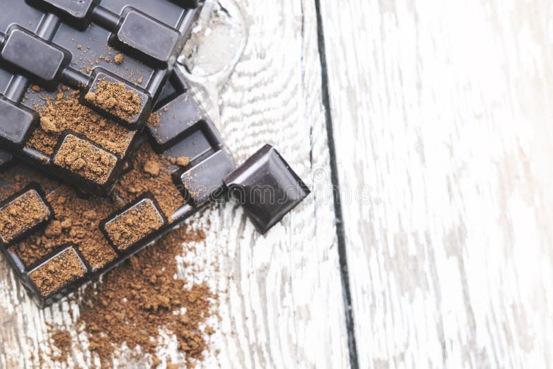 Chocolate Pieces. Chopped Dark Chocolate Closeup on Wooden Background ...