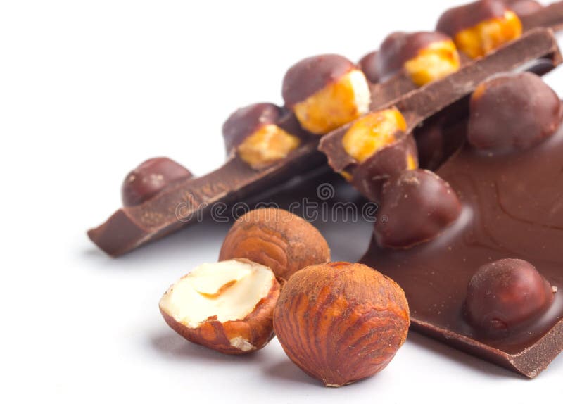 Chocolate Piles with Filberts on White Stock Photo - Image of slice ...