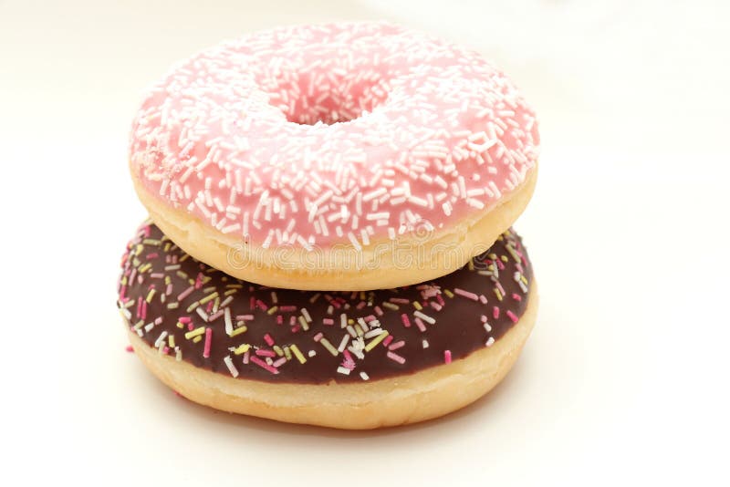 Chocolate and Pink Iced Donuts Stock Photo - Image of doughnut, food ...