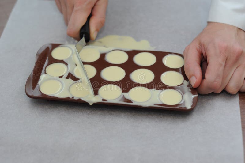 Chocolate praline stock image. Image of silicone, hold - 61593455