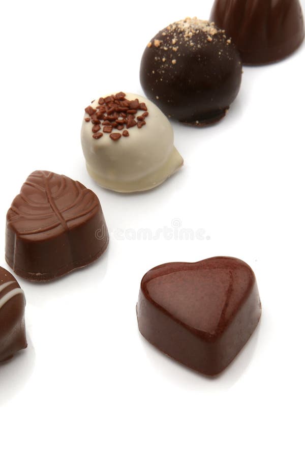 Delicious Chocolate Pralines Stock Image - Image of heart, bite: 5245991