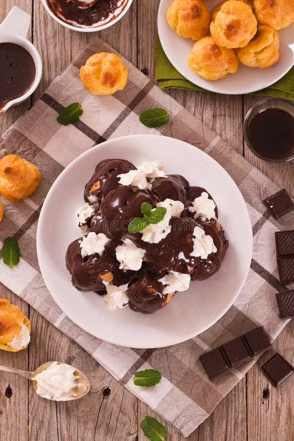 Chocolate profiterole. stock photo. Image of gastronomy - 136328074