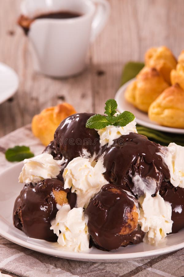 Chocolate profiterole. stock photo. Image of bignauml - 136329112