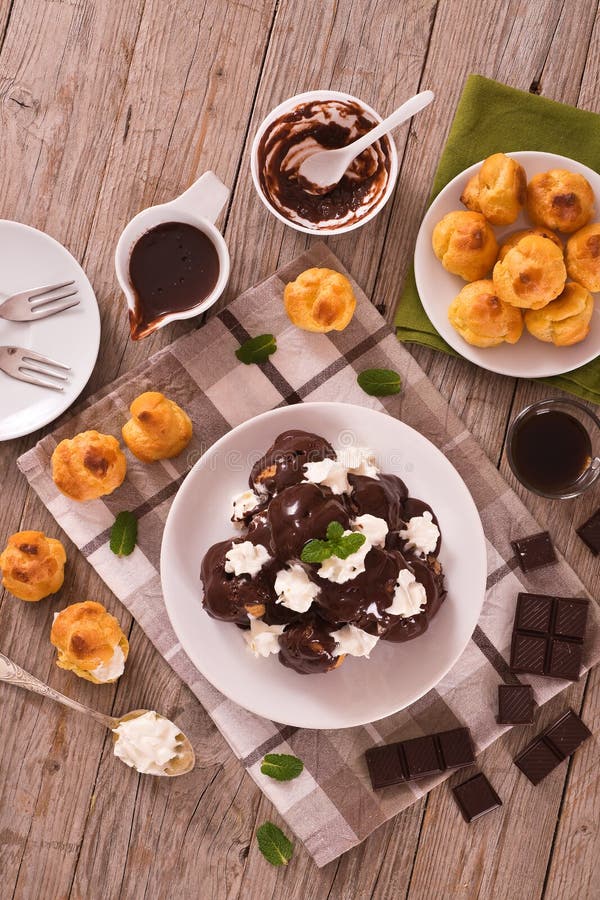 Chocolate profiteroles. stock photo. Image of culinary - 144854576