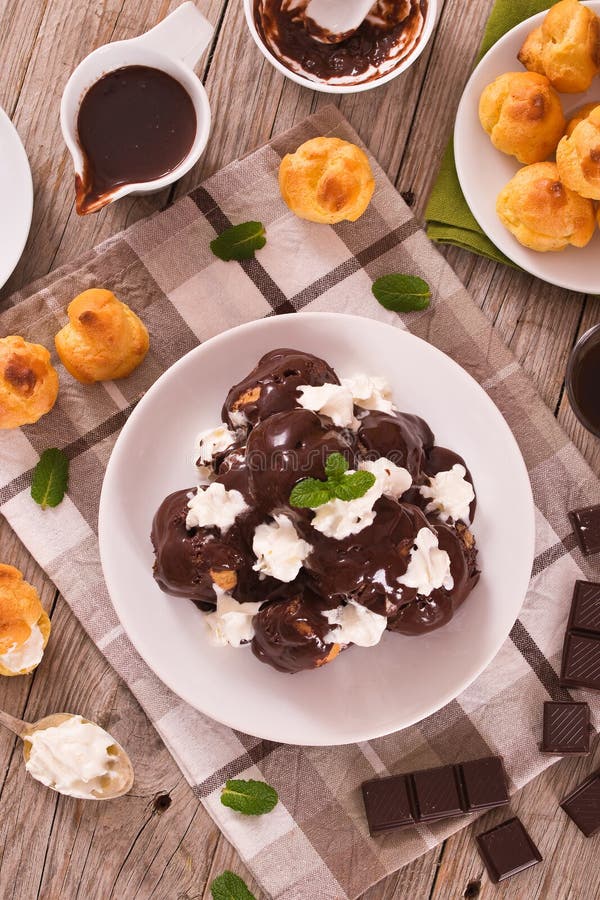 Chocolate profiteroles. stock image. Image of chantilly - 141804637