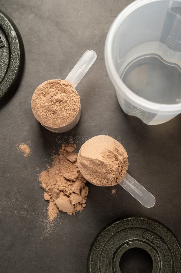 Chocolate Protein Powder in Scoops. Food Supplement, Nutrition Stock ...